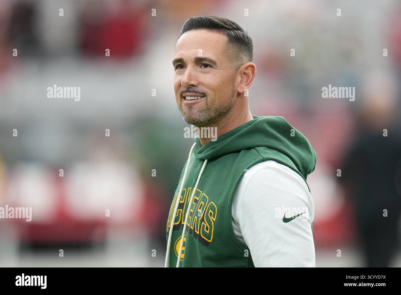 Green Bay Packers head coach Matt Lafleur warms up against the Arizona ...