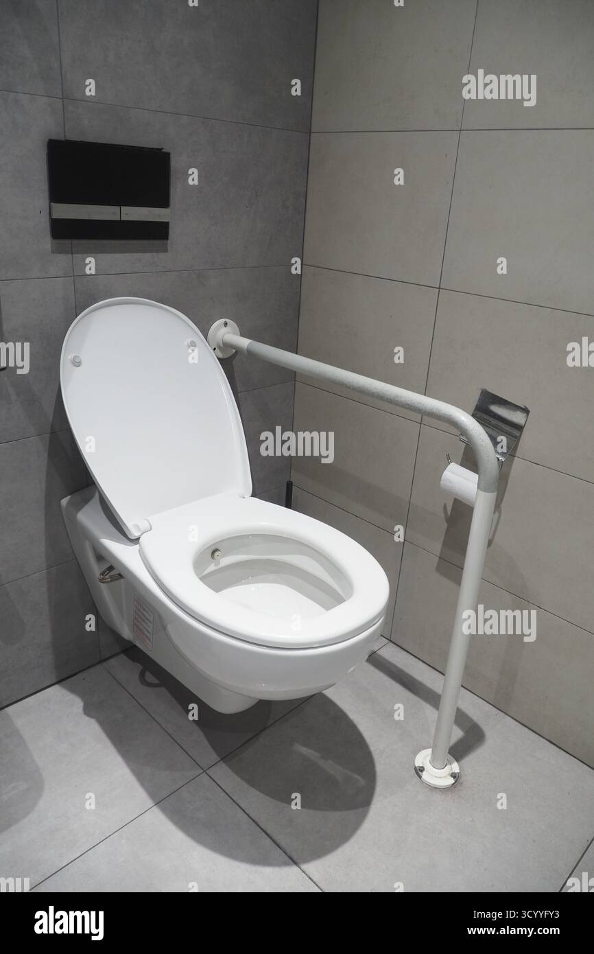 Modern restroom design with accessible toilet features Stock Photo - Alamy