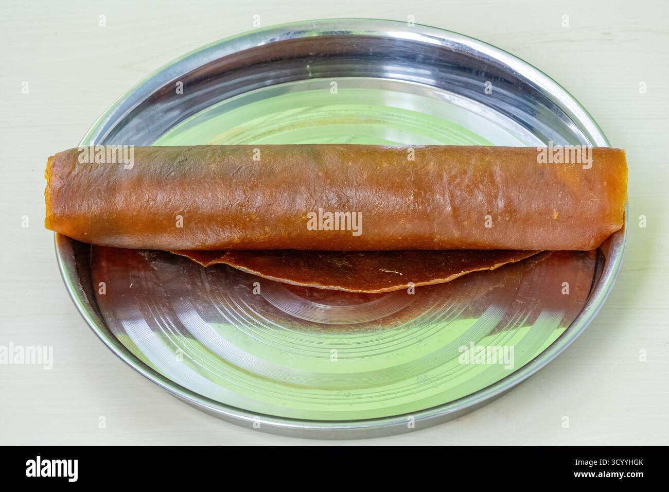 Aam papad is an Indian fruit leather made out of mango pulp mixed with ...