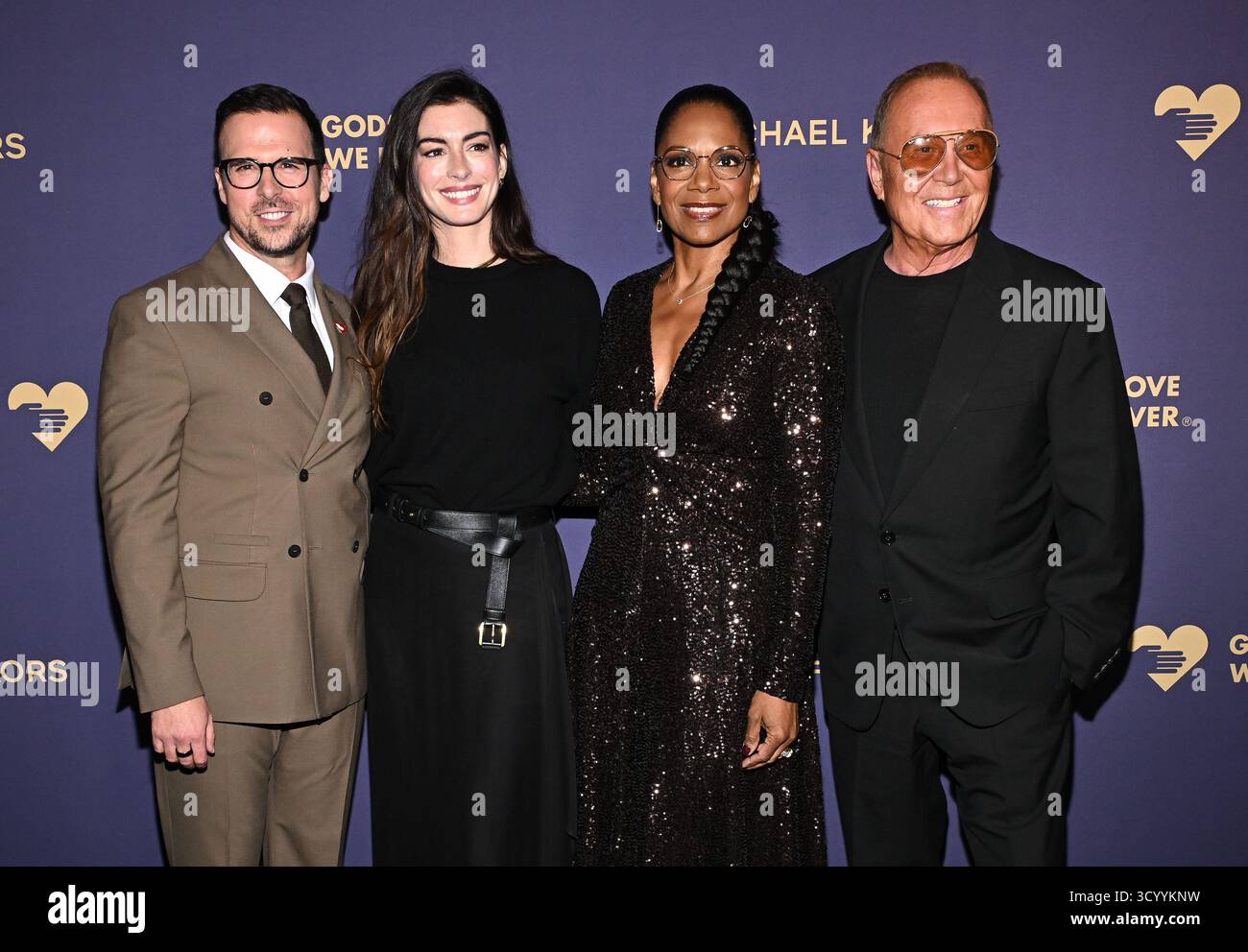 Terrence Meck, left, Anne Hathaway, Audra McDonald and Michael Kors ...