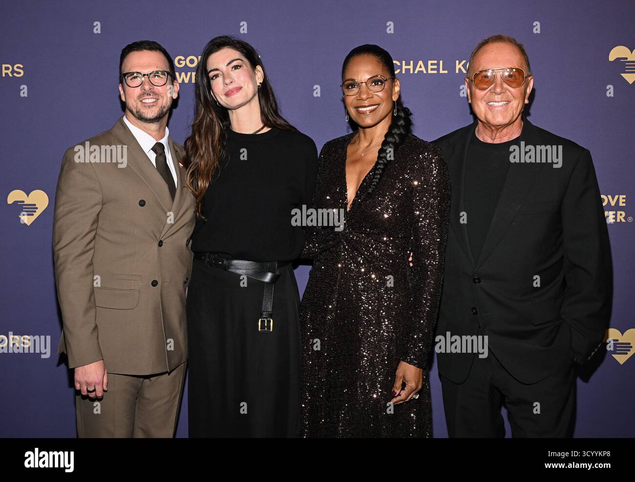 Terrence Meck, left, Anne Hathaway, Audra McDonald and Michael Kors ...