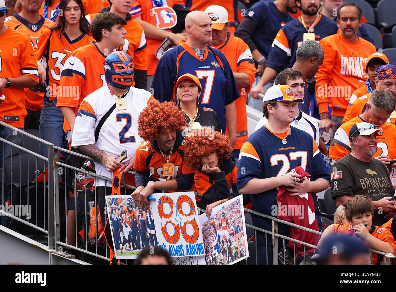 Fans wait for Denver Broncos players as they warm up before an NFL ...