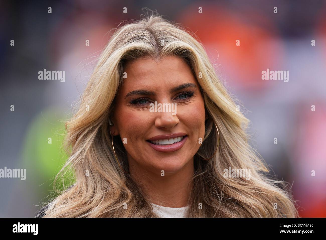Televison sidelines reporter Melanie Collins looks on as players warm ...