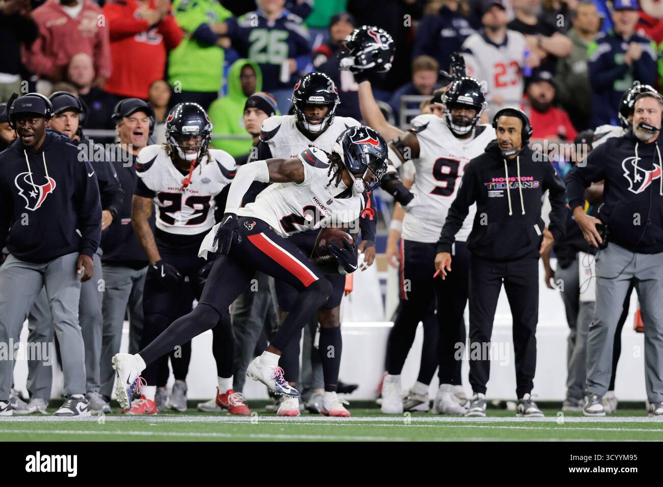The sideline celebrates after Houston Texans safety Calen Bullock (2 ...