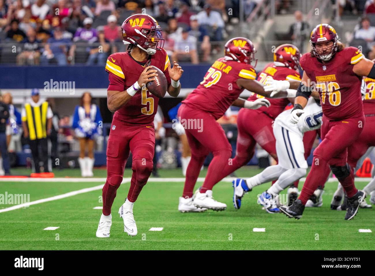 Washington Commanders quarterback Jayden Daniels looks to pass during a ...