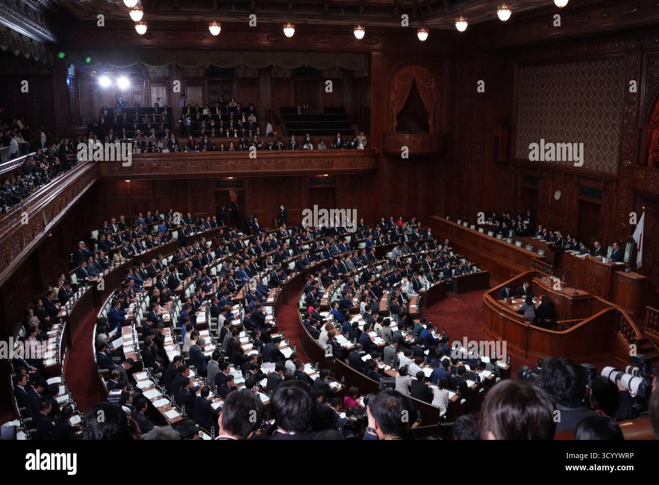 Lawmakers attend an extraordinary session to elect Japan's new prime ...