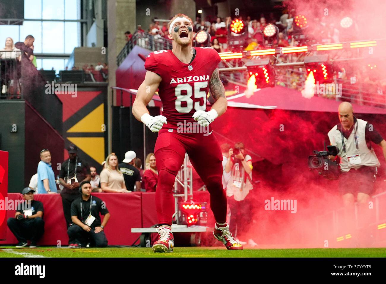 Arizona Cardinals tight end Trey McBride runs on the field during ...