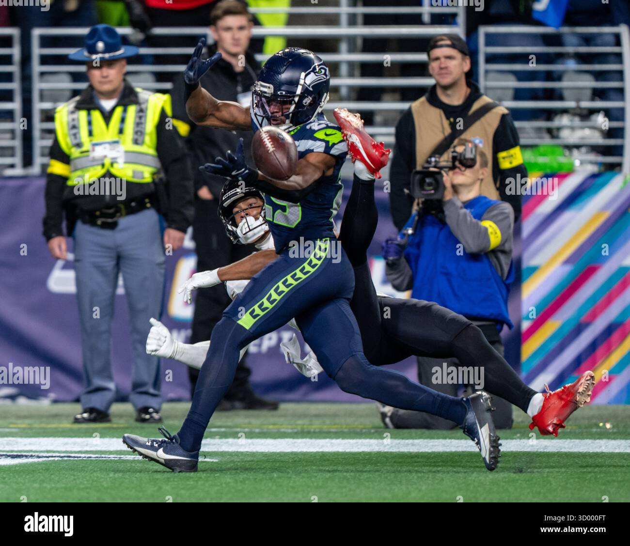Seattle Seahawks defensive back Josh Jobe breaks up a pass intended for ...
