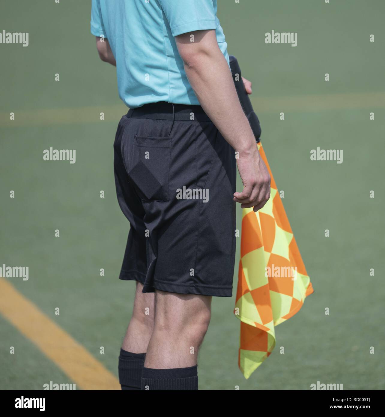 Linesmen, assistant referees at soccer matches in action linesmen ...