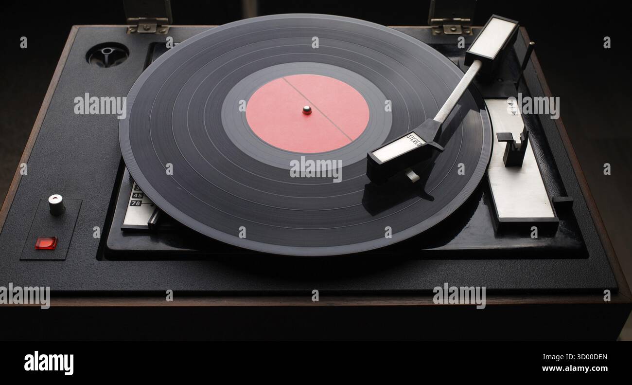 Photography of old black player with vinyl records Stock Photo - Alamy