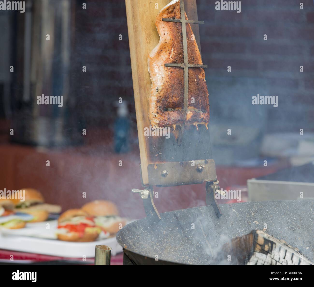 Grilling and smoking salmon on an open fire Salmon cooking and smoking ...