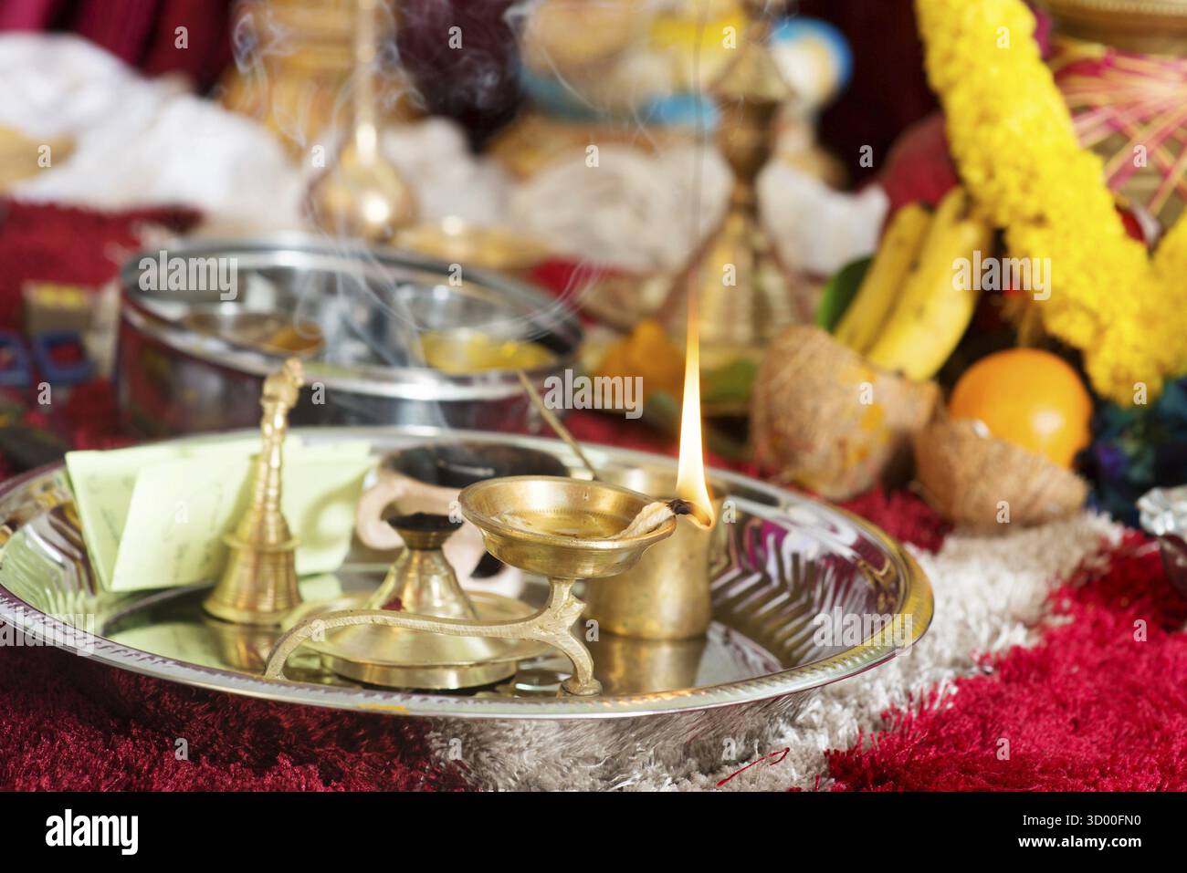 Traditional Indian Hindu religious praying items in ear piercing ...