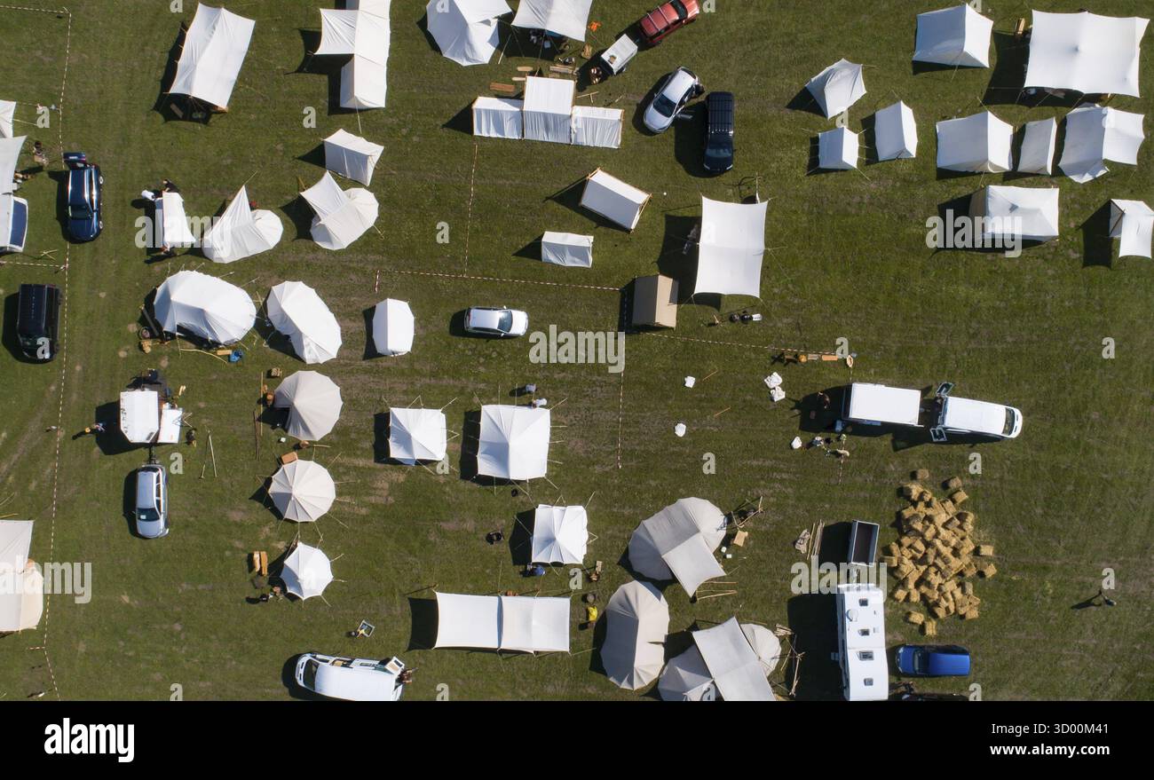 Aerial view with drone of a tent camp and market stalls at a medieval ...