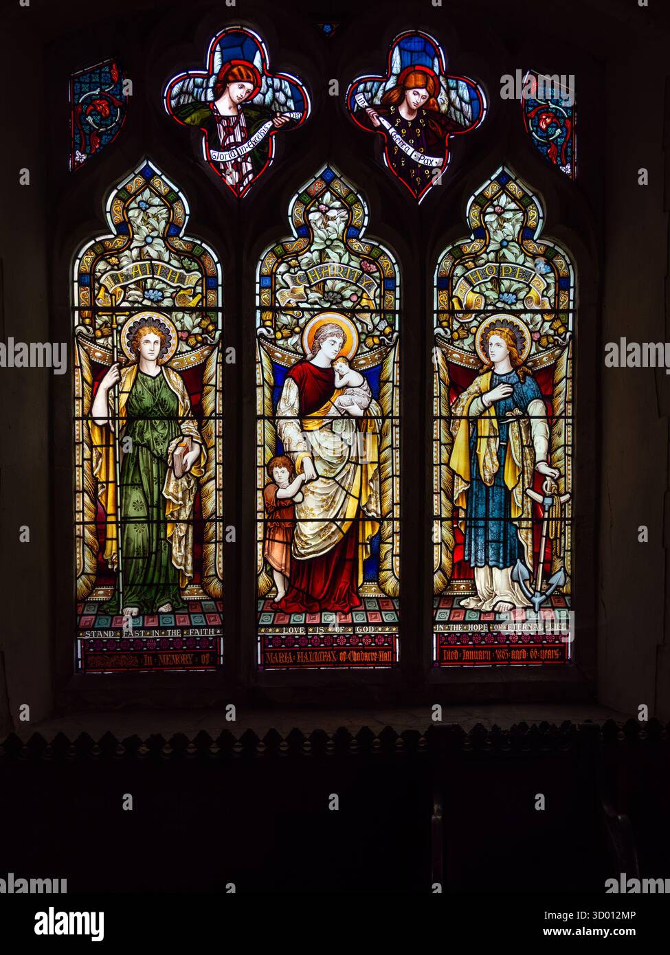 19th century Victorian stained glass window depicting Faith, Hope and ...