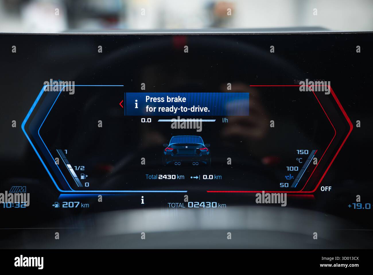 2025 BMW M2 digital cluster prompt with gauges in workshop Stock Photo ...