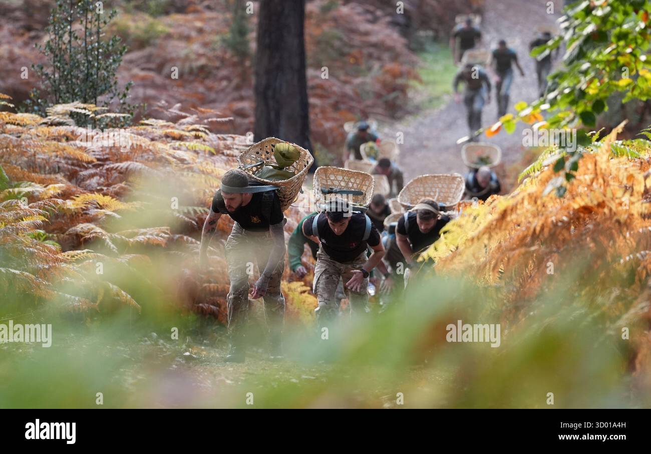 Members of the military take part in the tri-service Gurkha Doko race ...