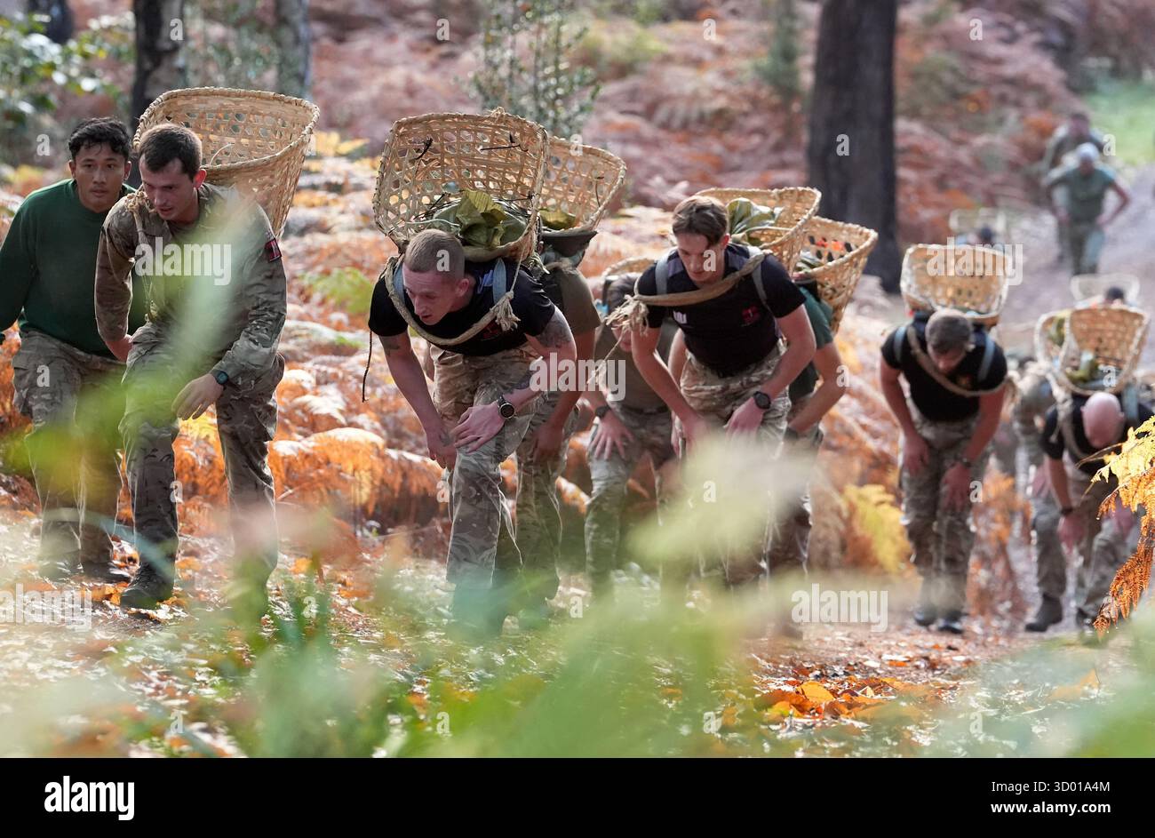 Members of the military take part in the tri-service Gurkha Doko race ...