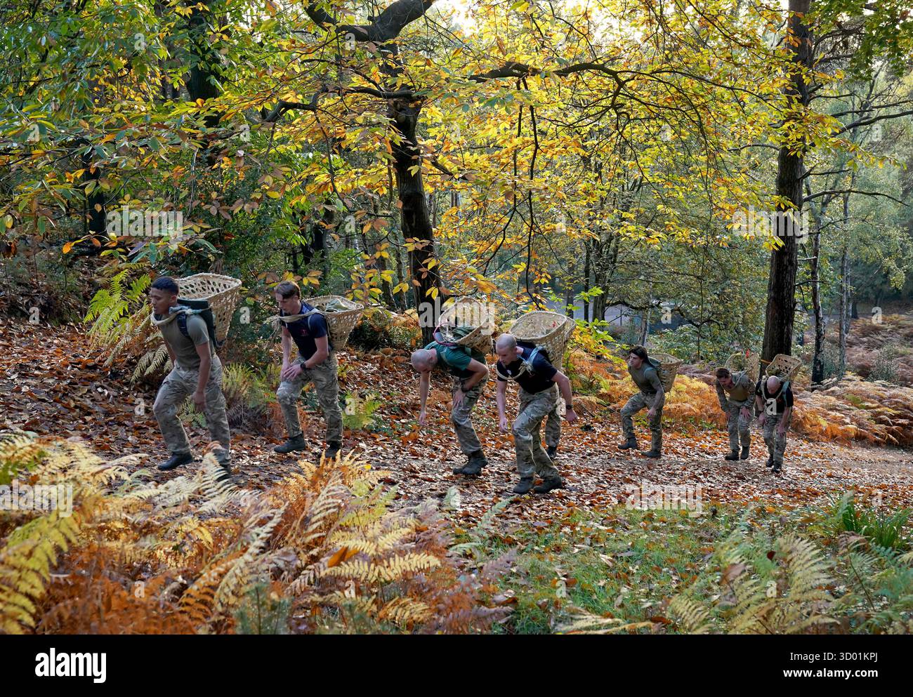 Members of the military take part in the tri-service Gurkha Doko race ...