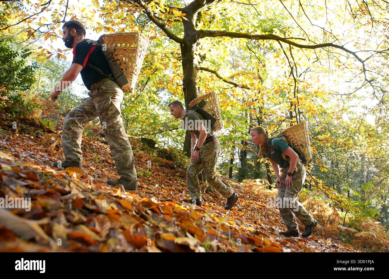 Members of the military take part in the tri-service Gurkha Doko race ...