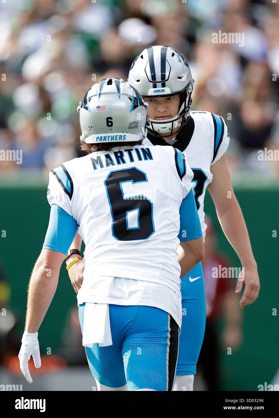 Carolina Panthers kicker Ryan Fitzgerald (10) reacts with Sam Martin (6 ...
