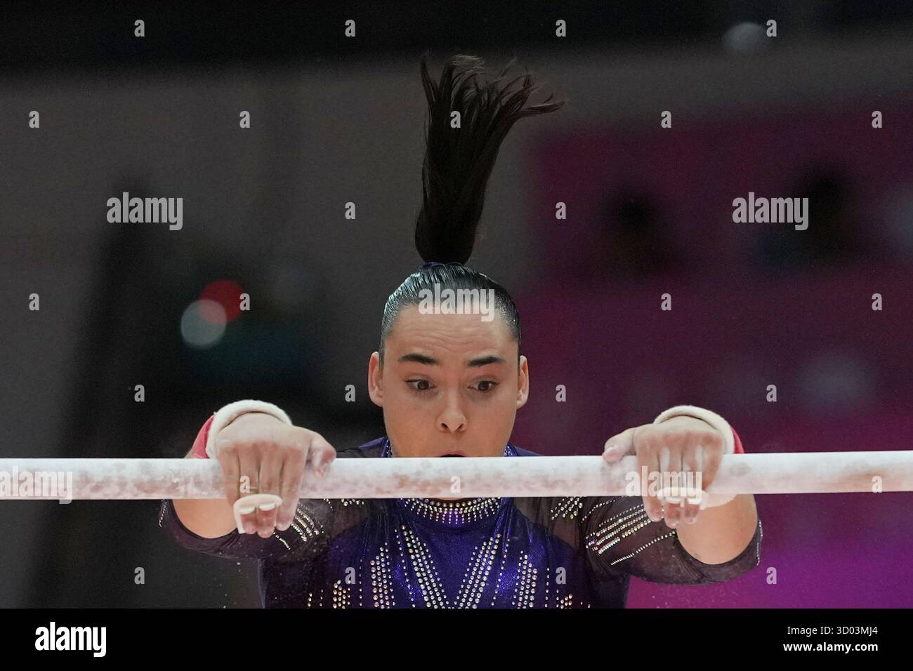 Alba Petisco of Spain competes on the uneven bars during the 53rd ...