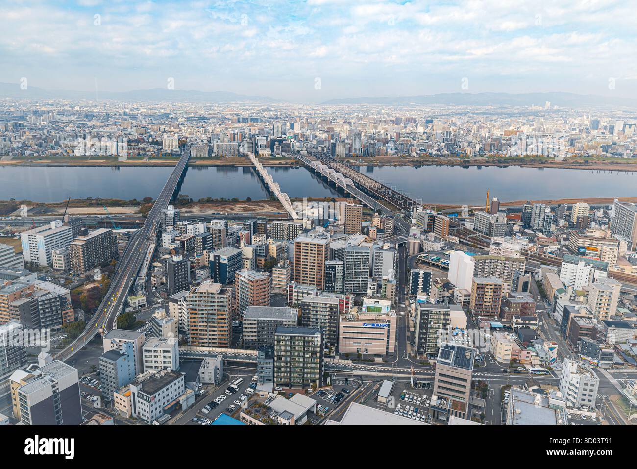 Osaka urban landscape showing river, bridges Stock Photo - Alamy