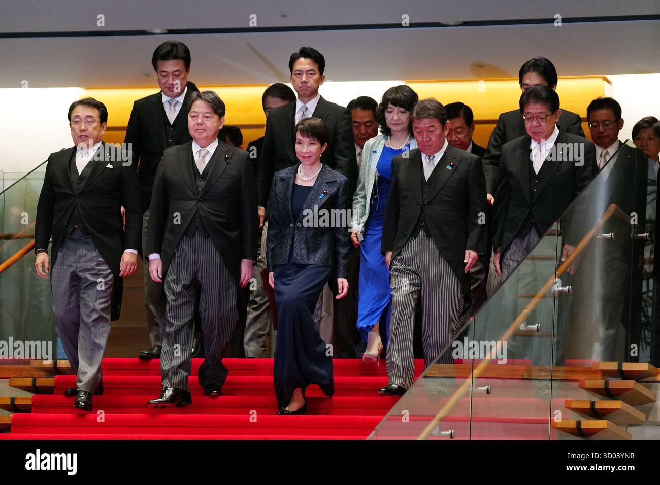 Japan Prime Minister Sanae Takaichi, front center, and her new cabinet ...