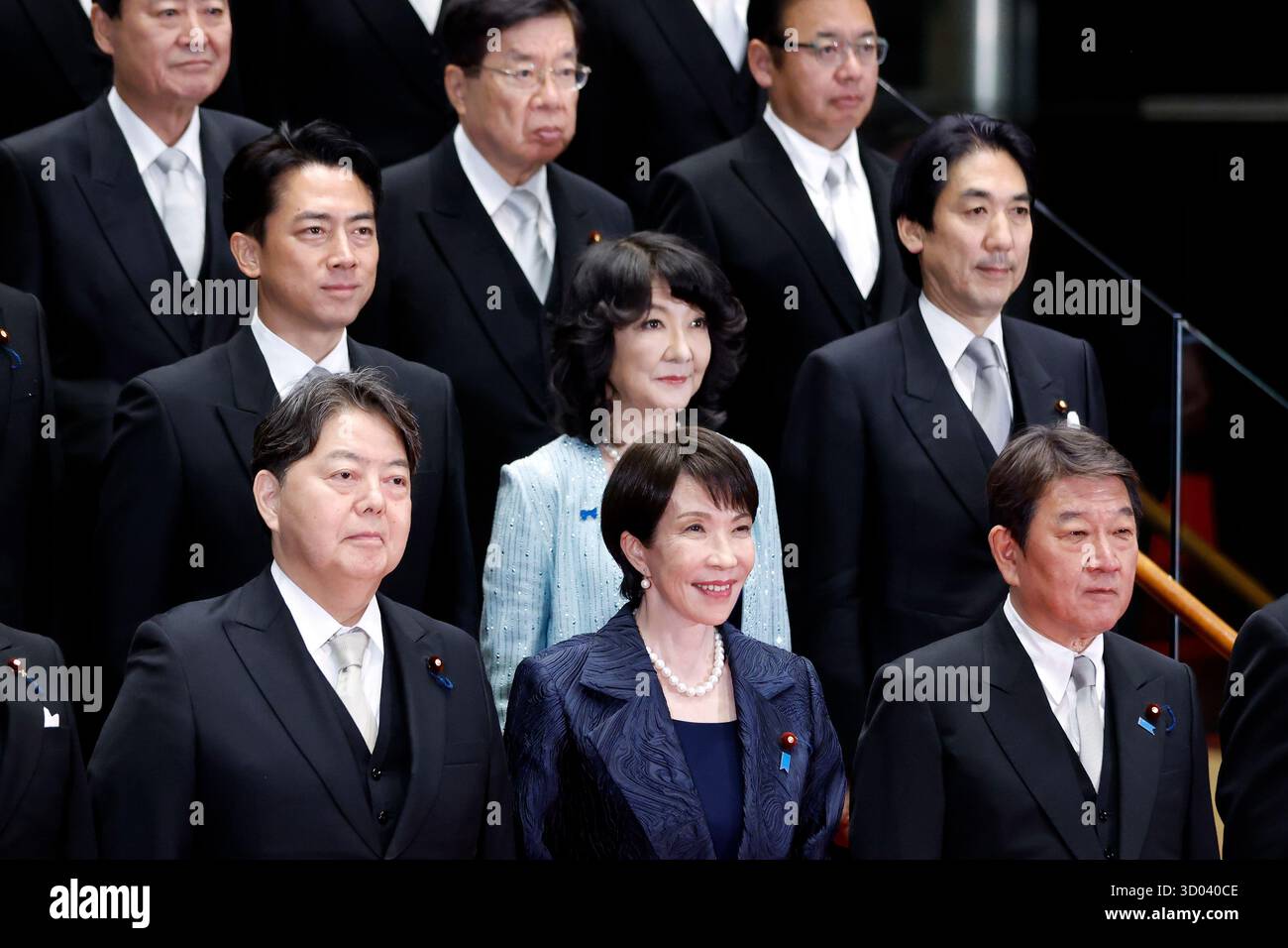 Japan's Prime Minister Sanae Takaichi, front row center, poses with her ...