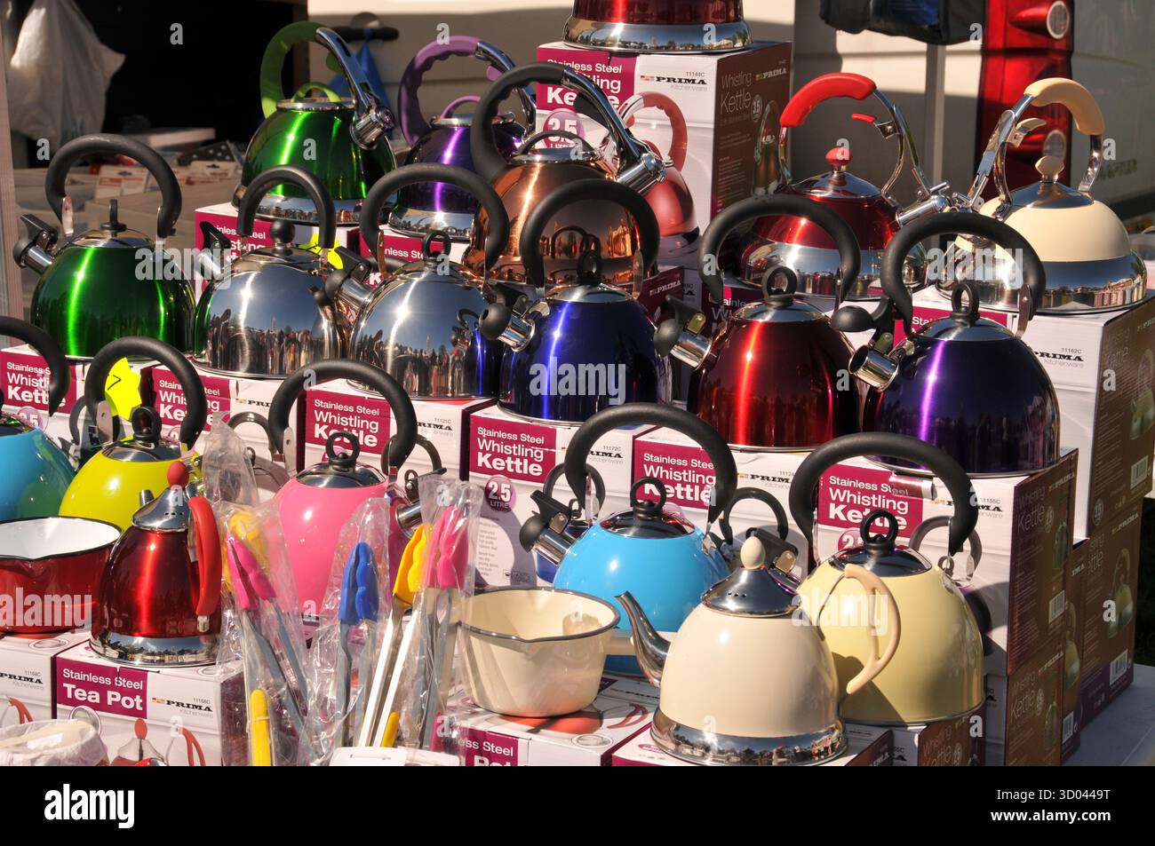 A variety of Whistling Kettles for sale on a stall at a motoring event ...
