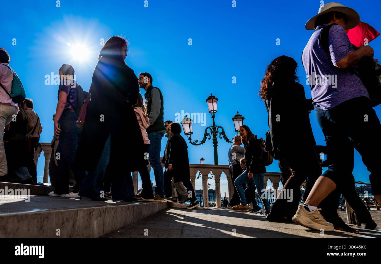 ITALY: travel image Venice, Italy, October 2025 Tourists on the Ponte ...