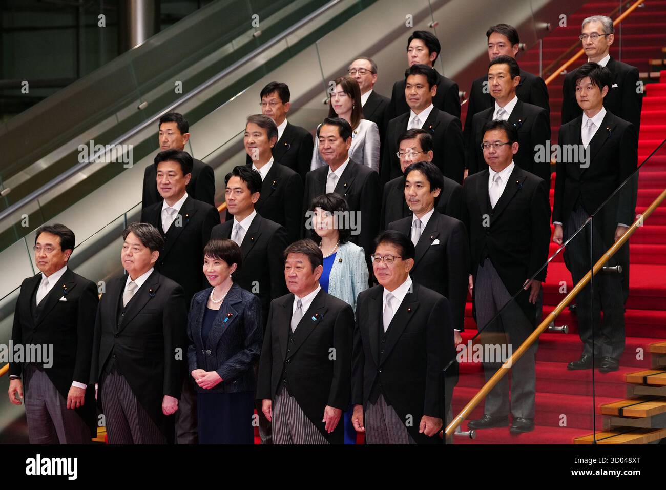 Japan Prime Minister Sanae Takaichi, front center, and her new cabinet ...