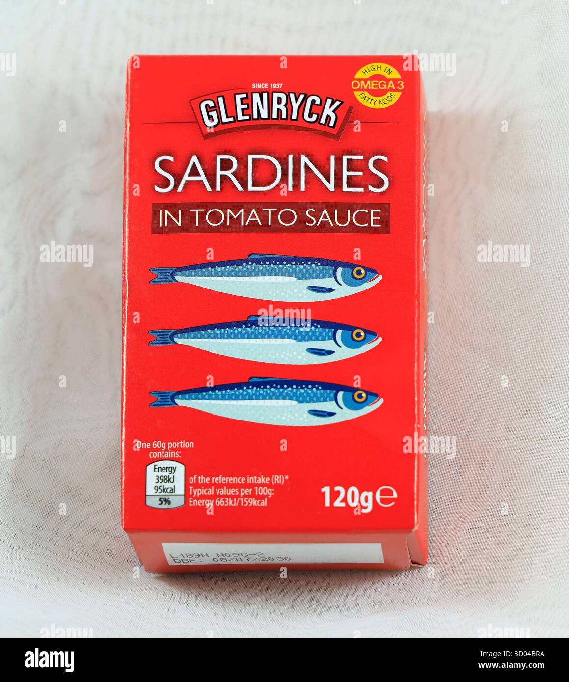 Photograph of a 120g red sardines in tomato sauce box on white ...