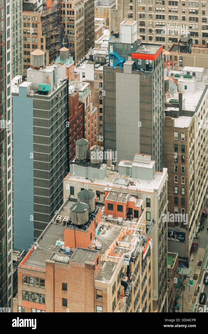 Urban skyline view from above showcasing rooftops and city buildings ...