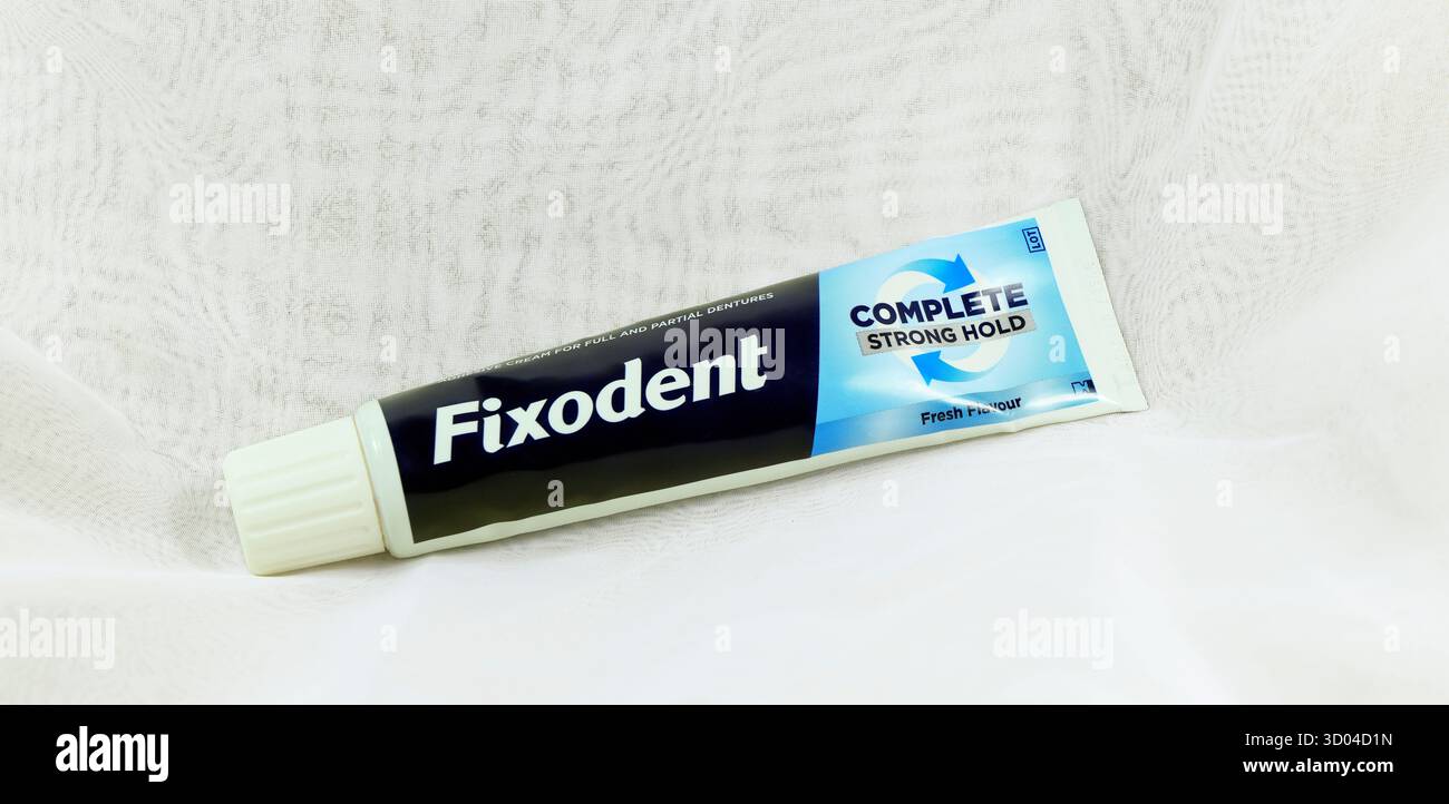 Photograph of a tube of Fixodent denture glue. Studio set up. Taken ...