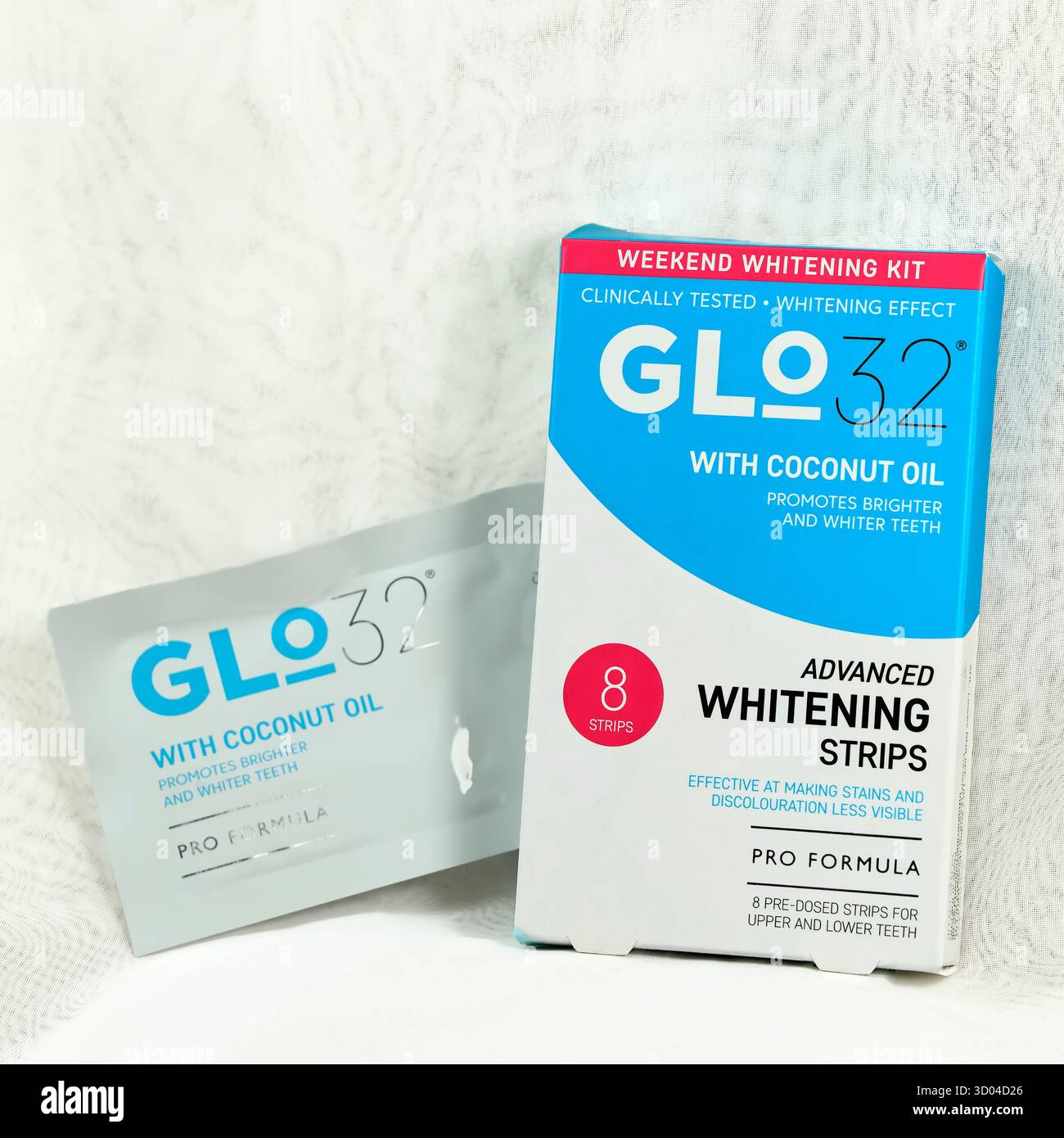 Photograph of Glo32 Advanced whitening strips caron and sachet. Studio ...