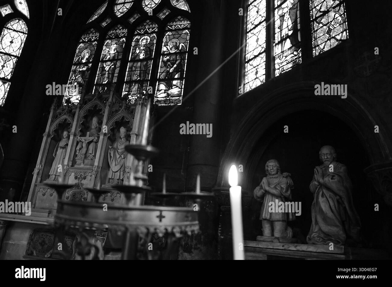 PARIS, FRANCE - APRIL: Sunbeam passing through stained-glass window ...
