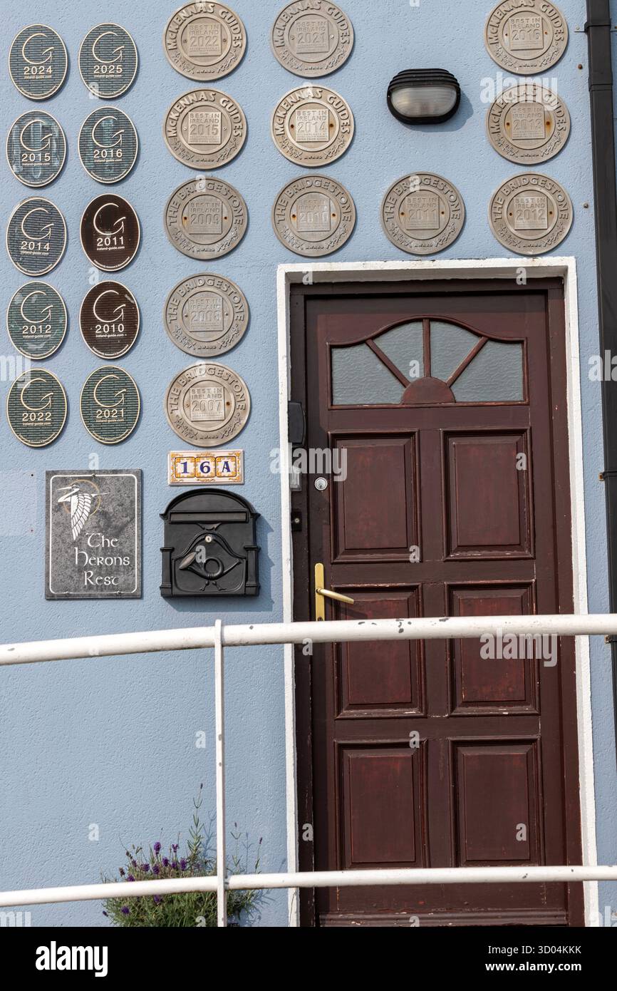 The Long Walk on Claddagh Quay, a row of colorful old houses by the ...