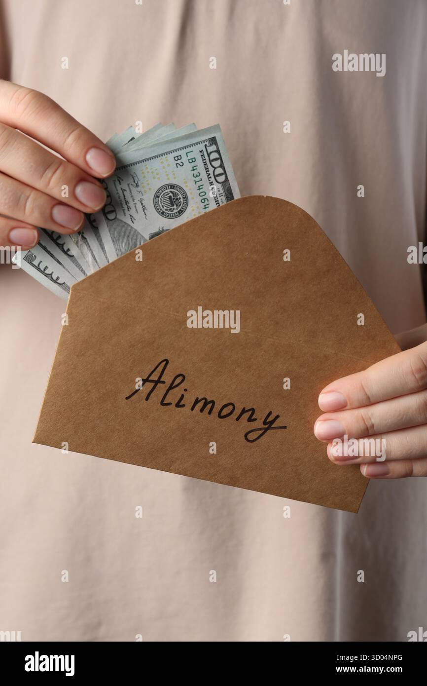 Alimony woman taking money hi-res stock photography and images - Alamy