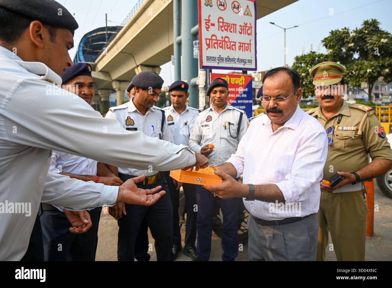 NOIDA, INDIA - OCTOBER 20: GBN DCP Traffic celebrated Diwali by feeding ...