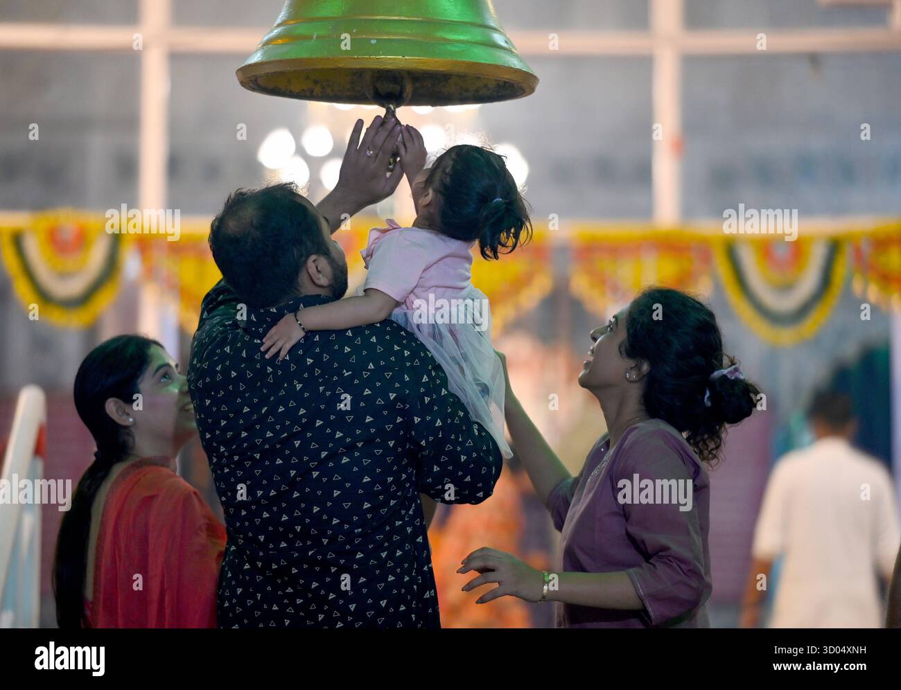 NOIDA, INDIA - OCTOBER 20: People offer prayers at a temple on the ...