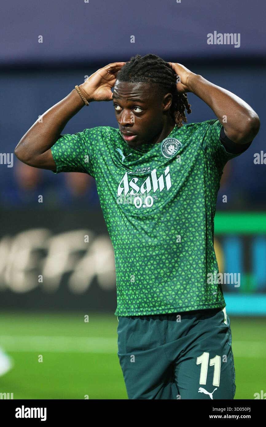 Manchester City's Jeremy Doku warms up prior to the Champions League ...
