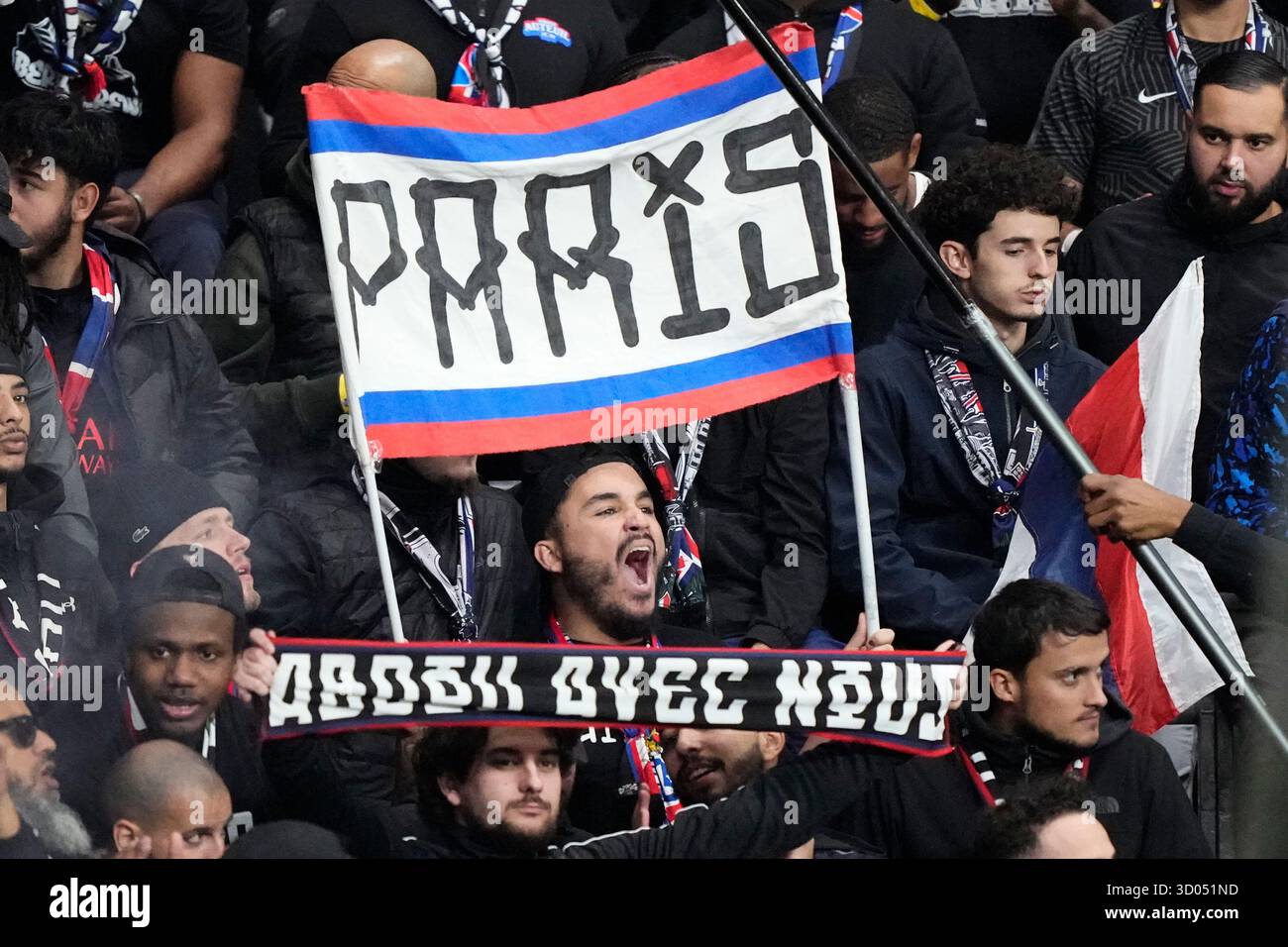 PSG fans cheer during a Champions League opening phase soccer match ...