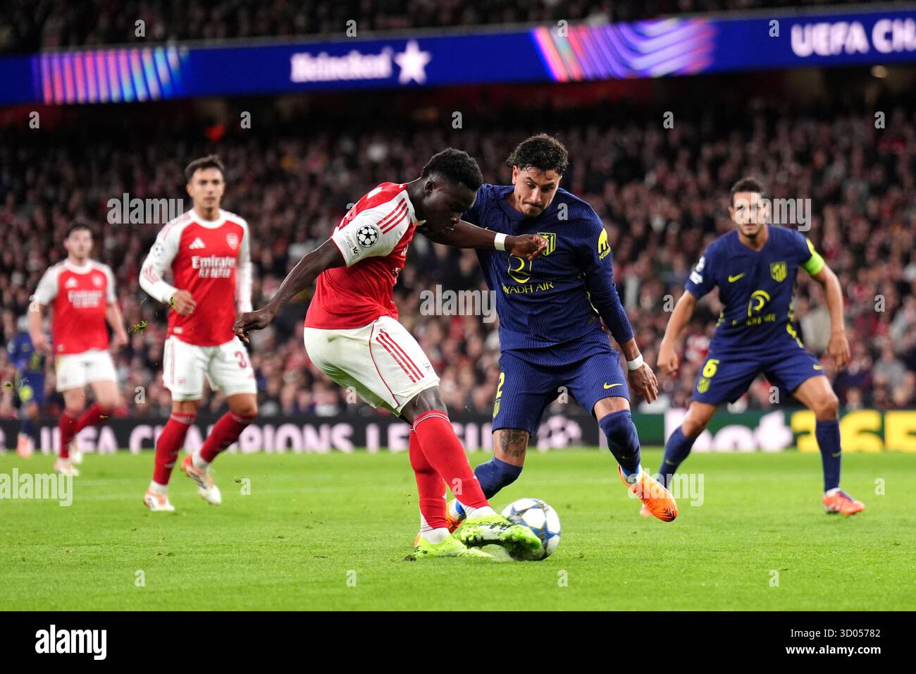Arsenal's Bukayo Saka (centre left) attempts a shot on goal during the ...