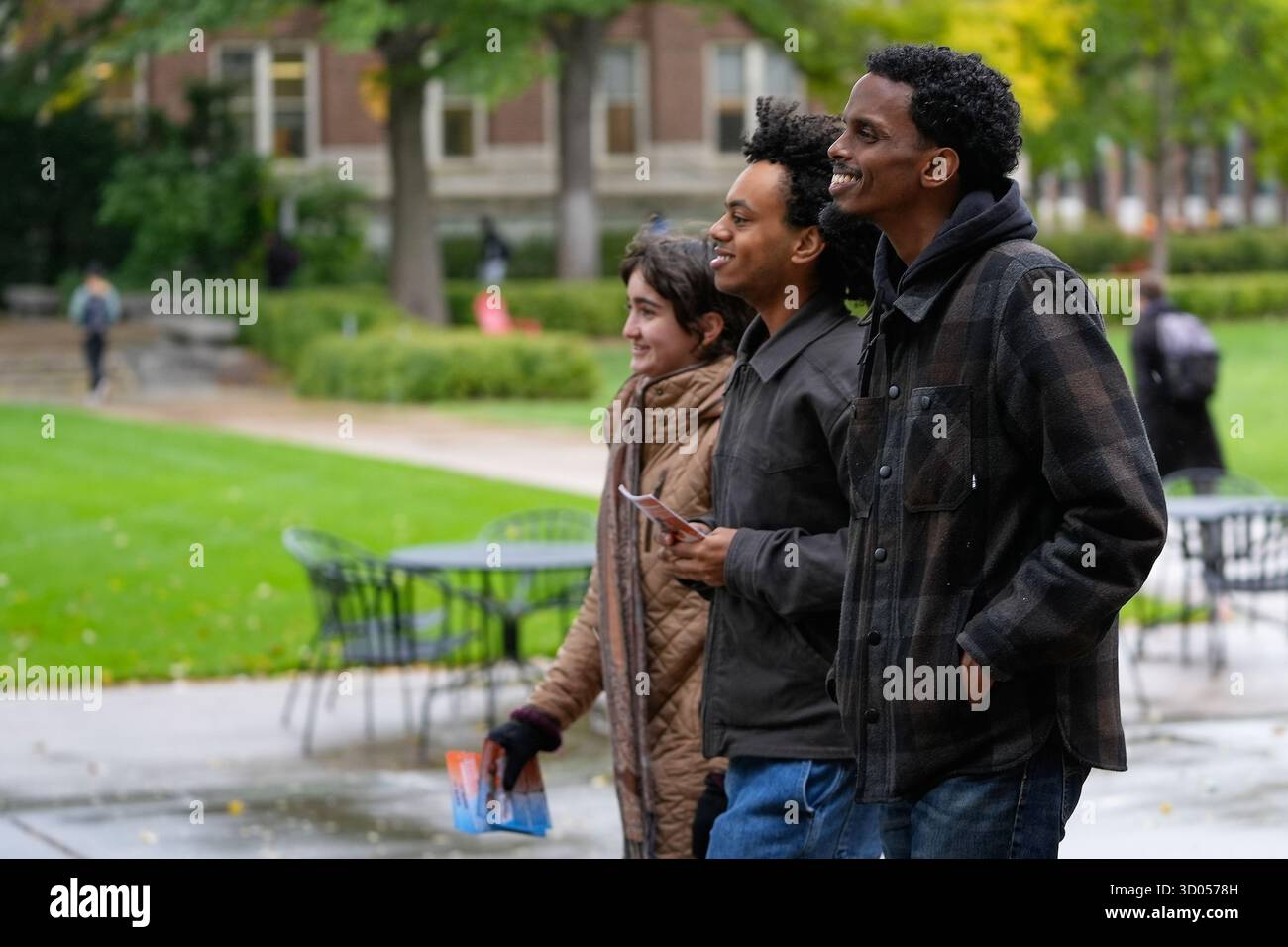 Minneapolis Mayor candidate Omar Fateh, right, walks through University ...