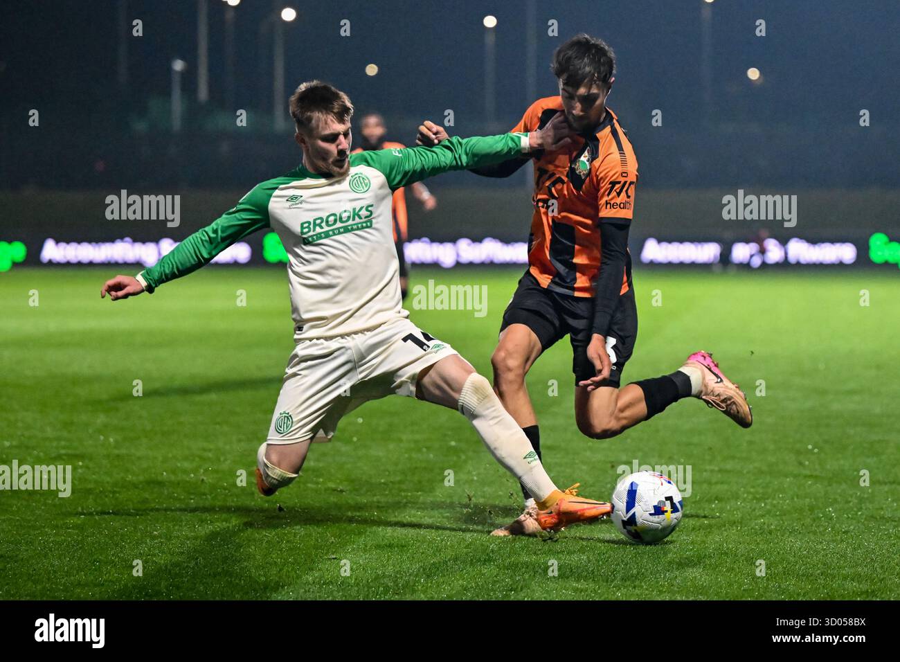 Benjamin Knight (14 Cambridge United) challenges Ryan Galvin (3 Barnet ...