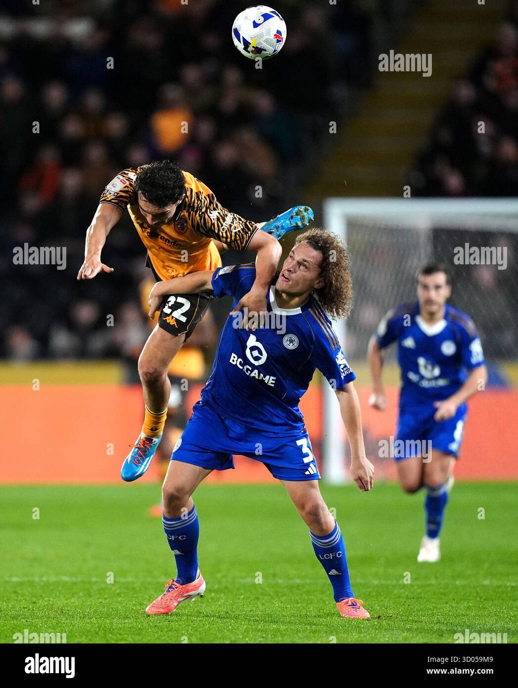 Hull City's Kyle Joseph (left) and Leicester City's Wout Faes battle ...