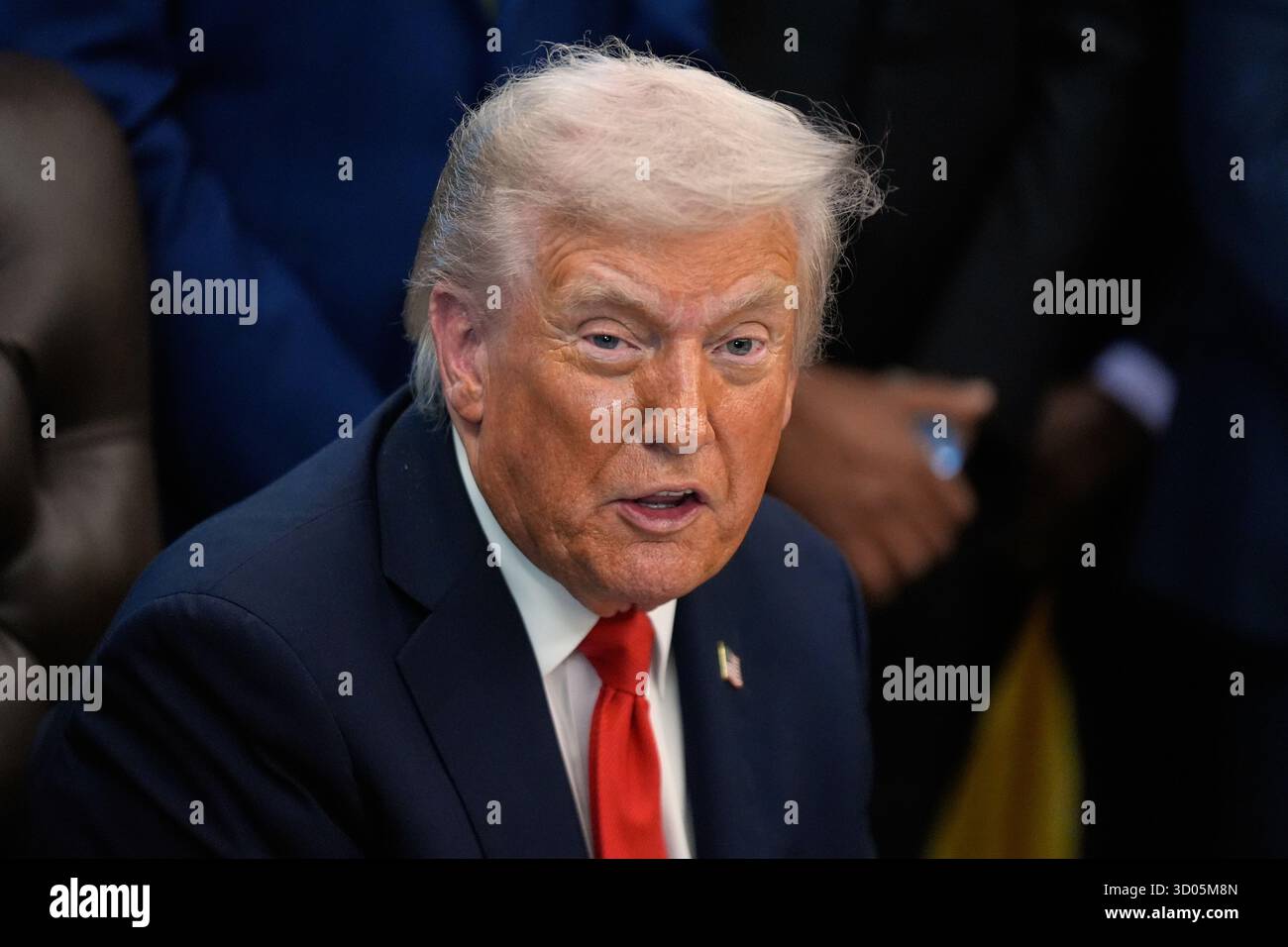 President Donald Trump answers questions from reporters during a Diwali ...
