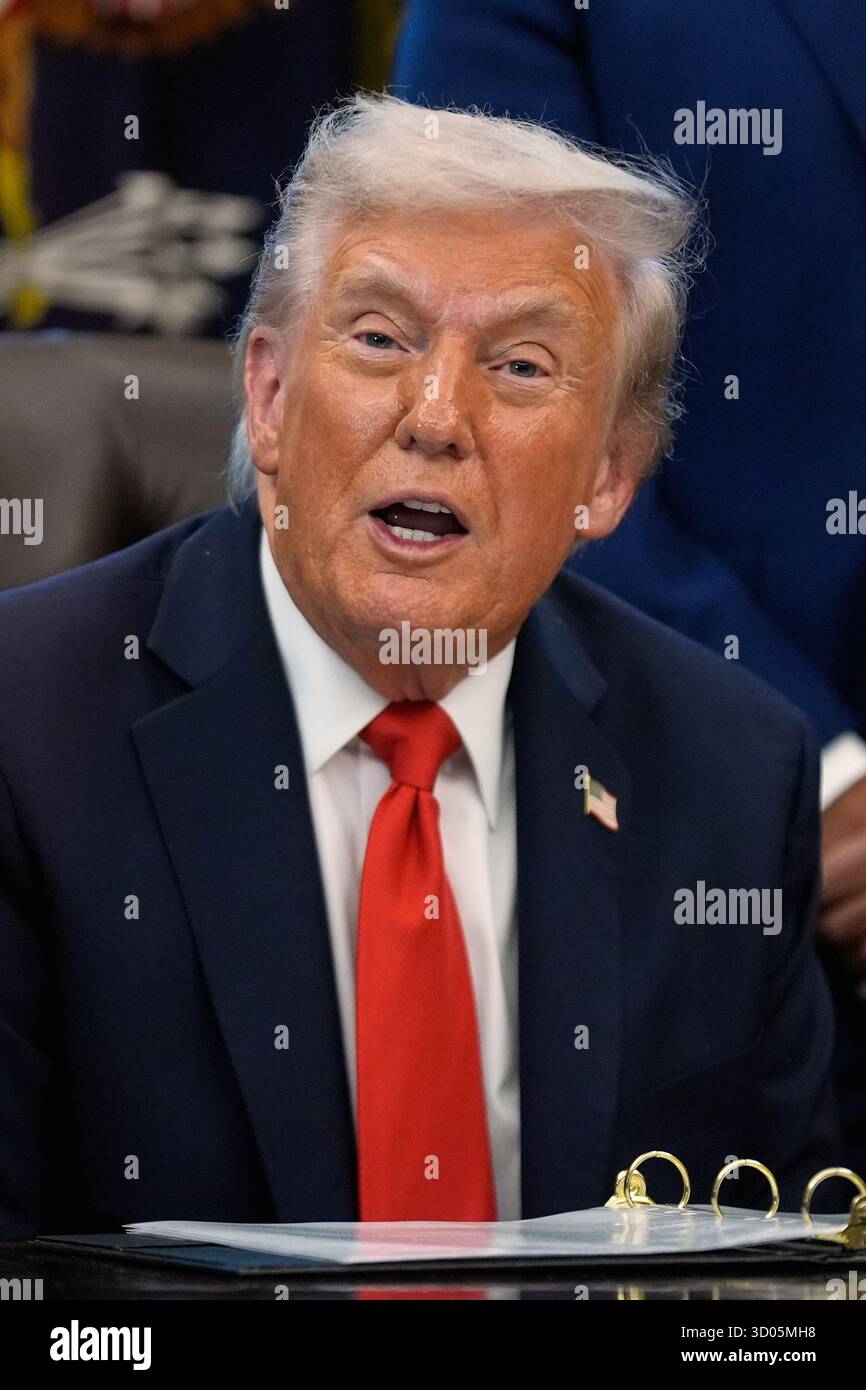 President Donald Trump answers questions from reporters during a Diwali ...