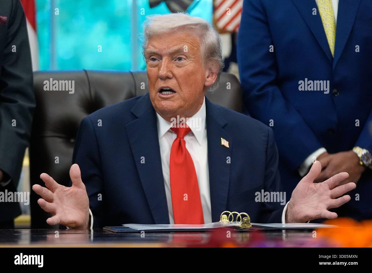 President Donald Trump answers questions from reporters during a Diwali ...