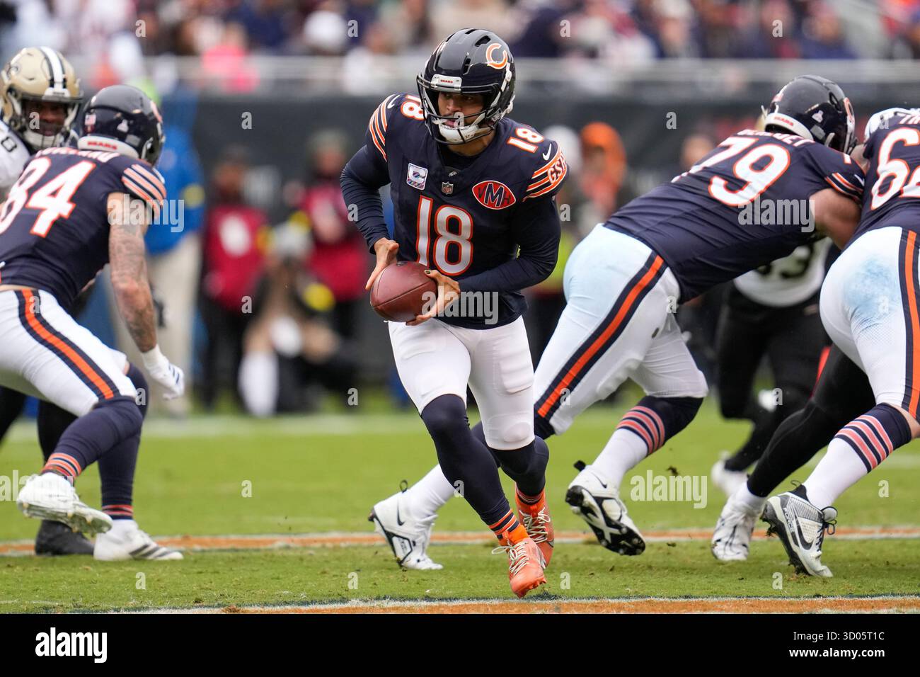 Chicago Bears quarterback Caleb Williams (18) handles the ball during ...